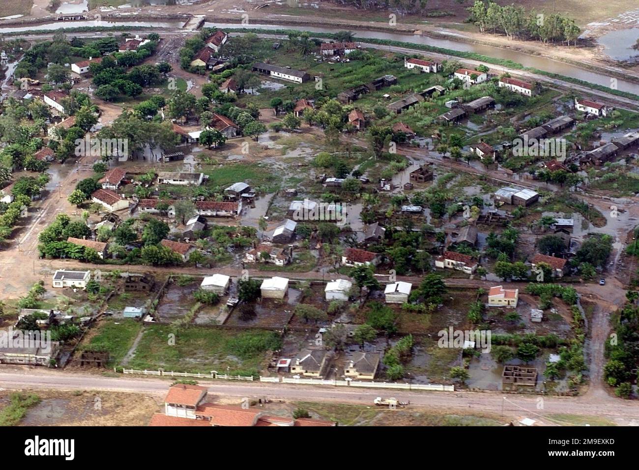 Aerial view, long shot, looking down as water fills the streets of the ...