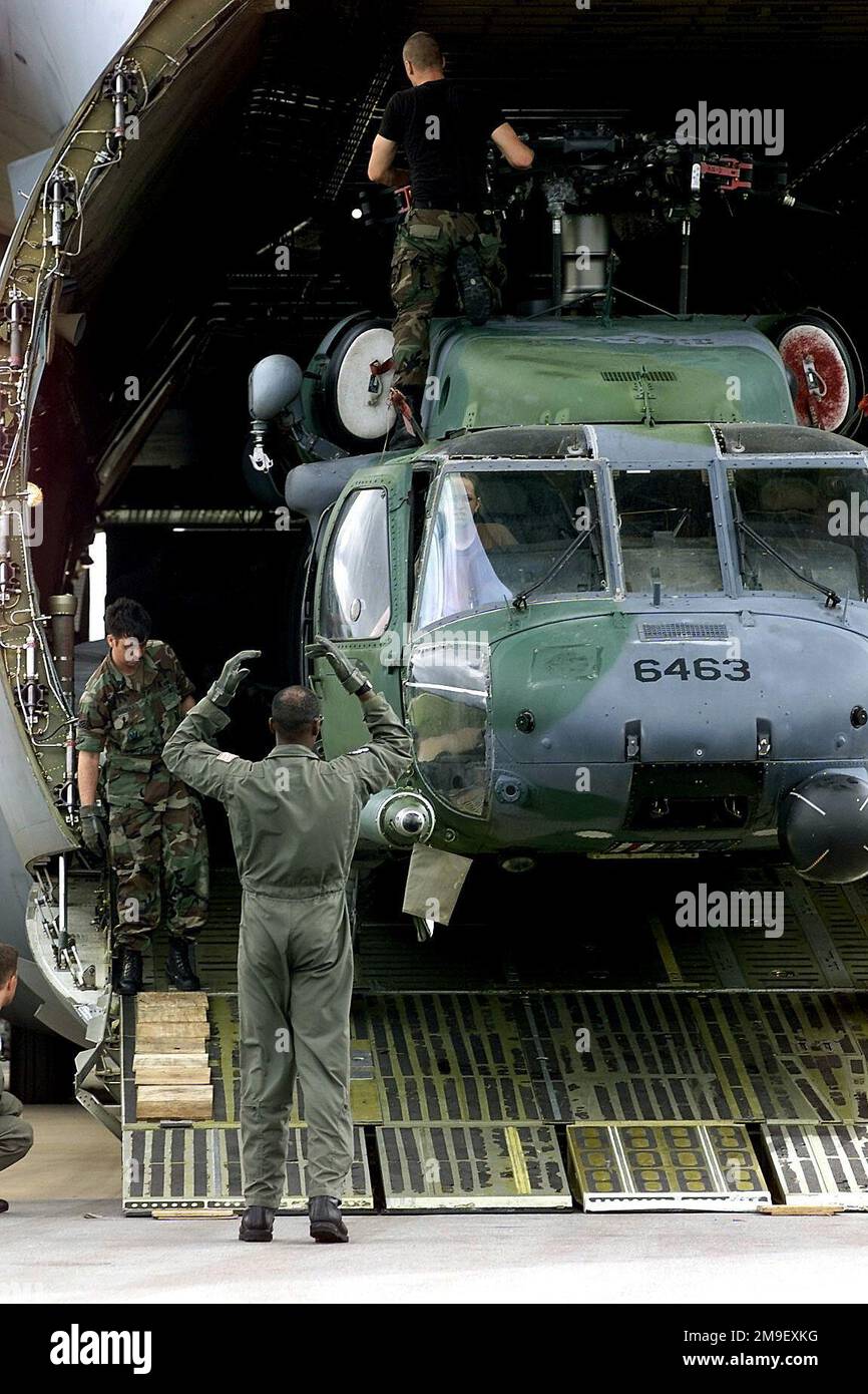 Following the direction of C-5 loadmaster MASTER Sergeant. Steven ...