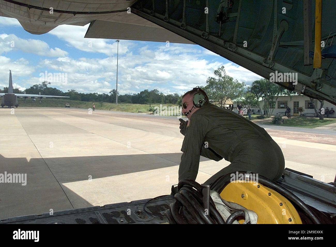 Interior, left side rear view, medium shot, as USAF STAFF Sergeant ...