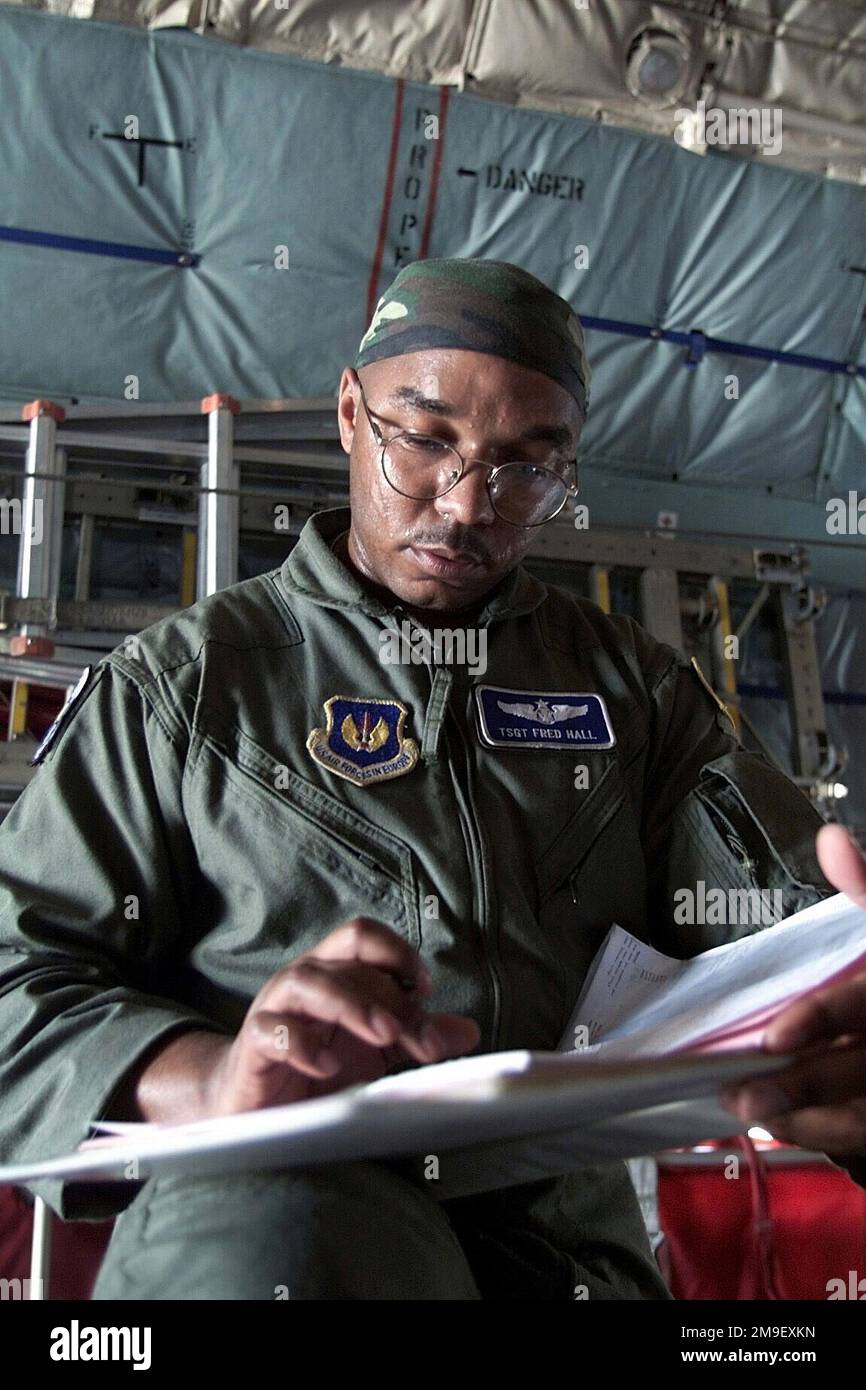 Interior straight on medium close-up shot as USAF Technical Sergeant ...