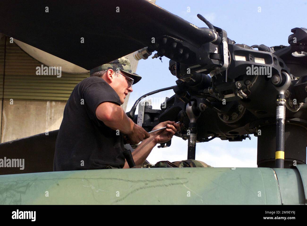 Medium shot. AIRMAN First Class Joe Martin, a MH-60 Pave Hawk Crew ...