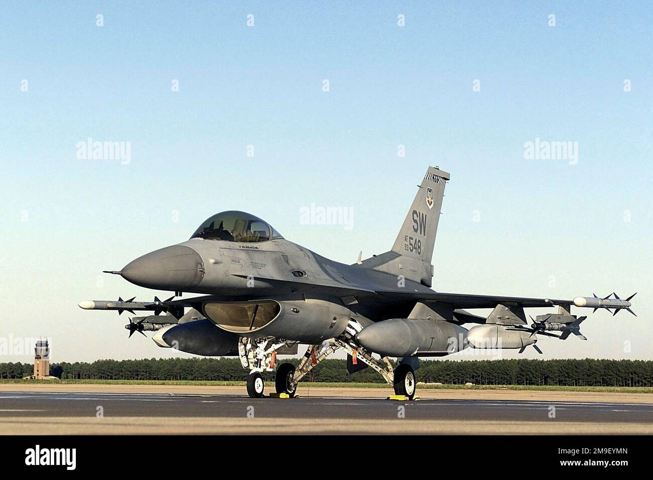 Left side front view medium shot as a USAF F-16CJ fighter aircraft at ...