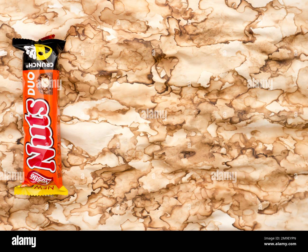 NUTS Crunch Duo chocolate bar with hazelnuts Stock Photo - Alamy