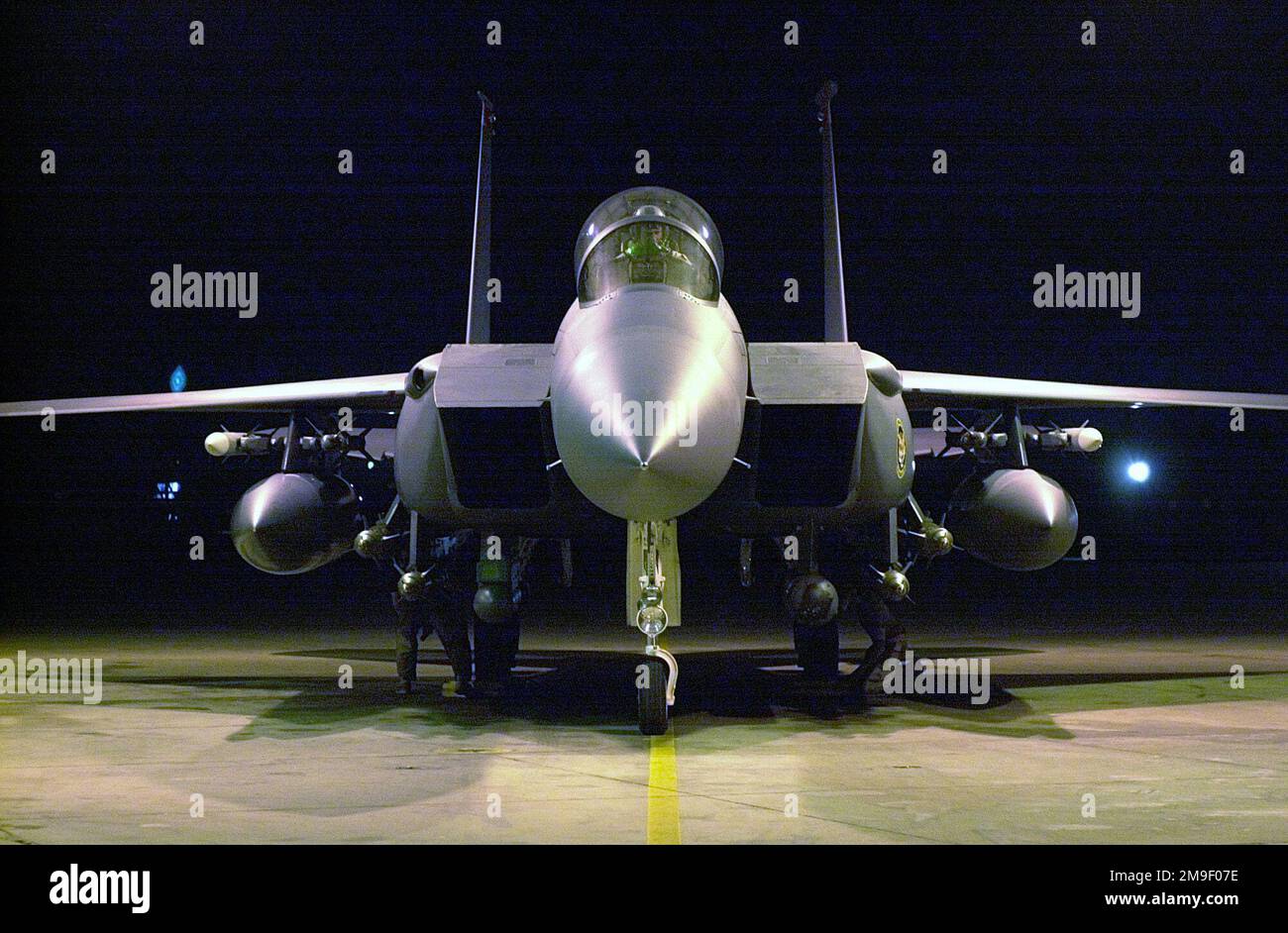 011017-F-0308N-443. [Complete] Scene Caption: At night an F-15E Strike ...