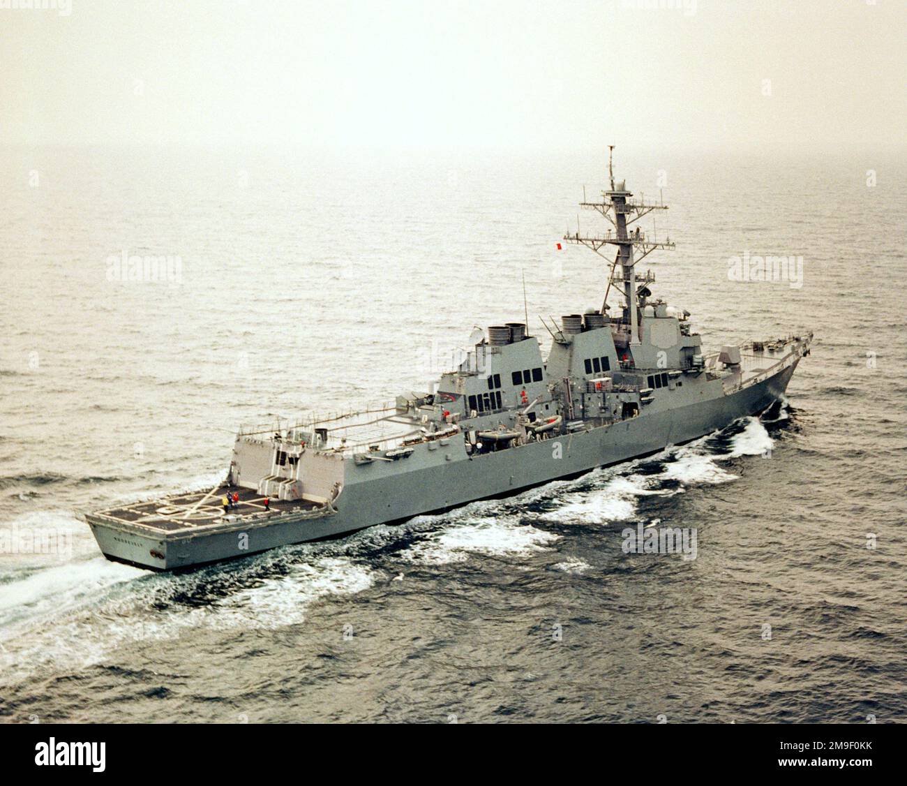 Starboard quarter view of the Arleigh Burke Block II Aegis class guided ...