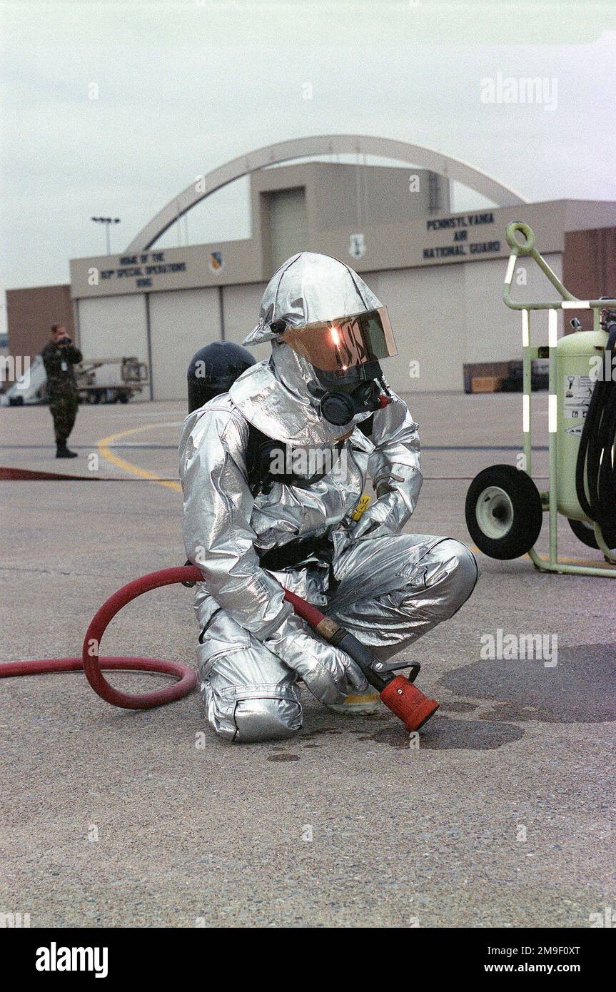 On the flight line at the 193rd SOW, a member of the 193rd Civil ...