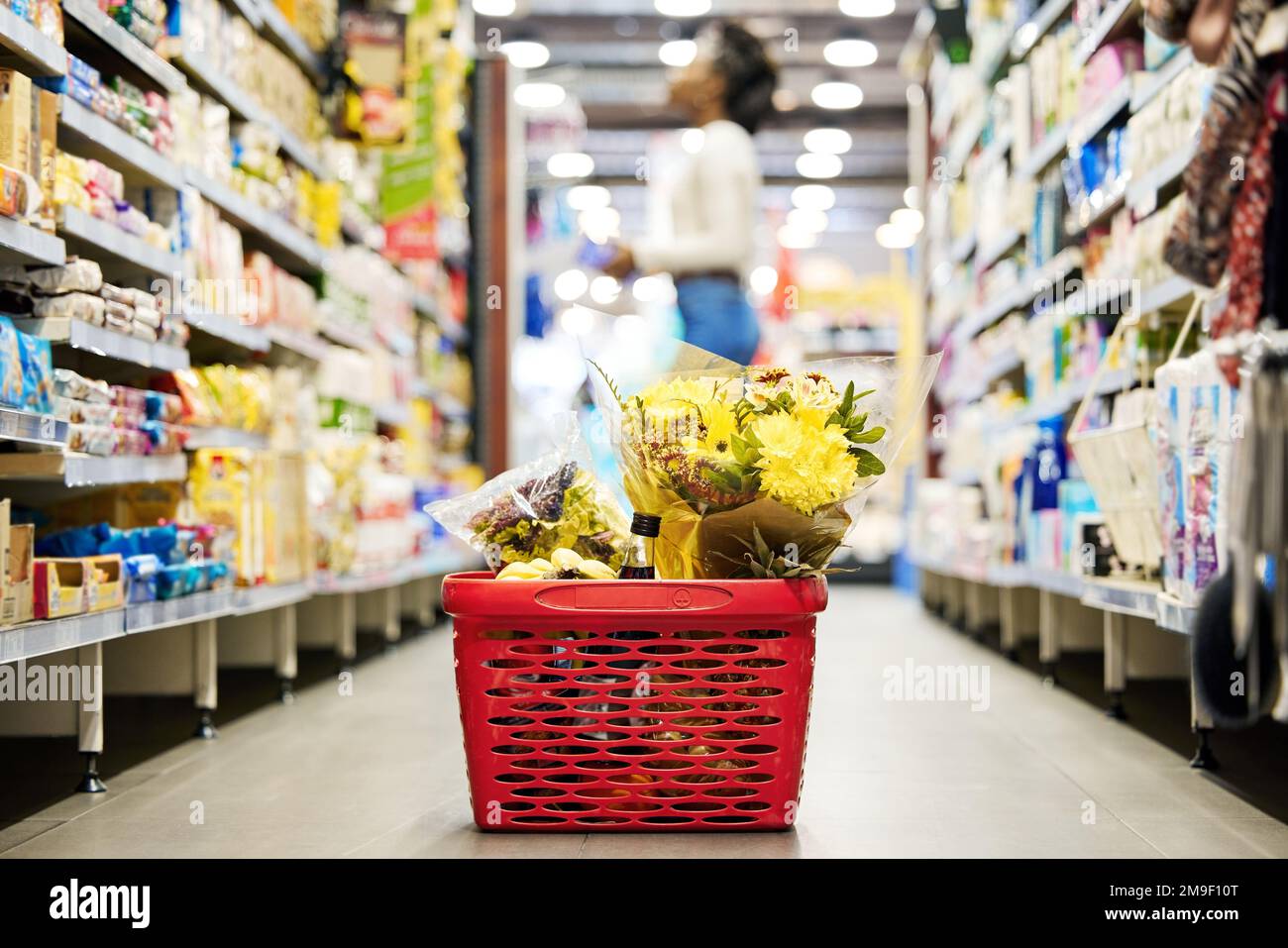 Ready to beautify my home. a shopping basket on the floor of a grocery ...