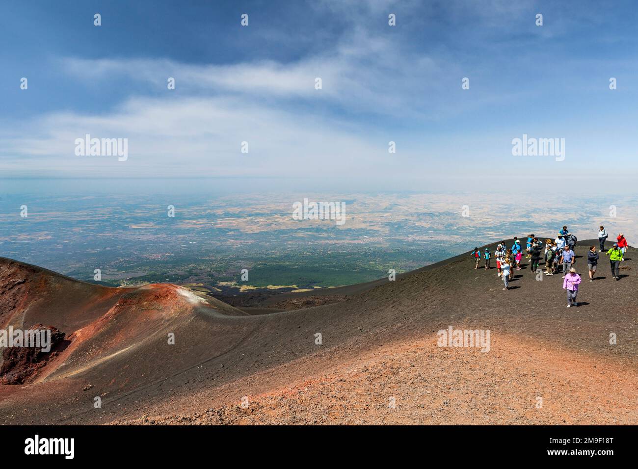 Tourists ascending Mount Etna, Europe’s highest volcano Stock Photo - Alamy