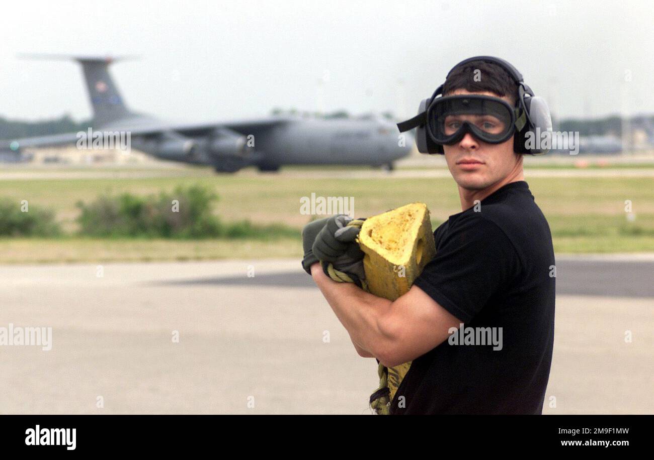Left side profile medium close-up shot as US Air Force AIRMAN First ...