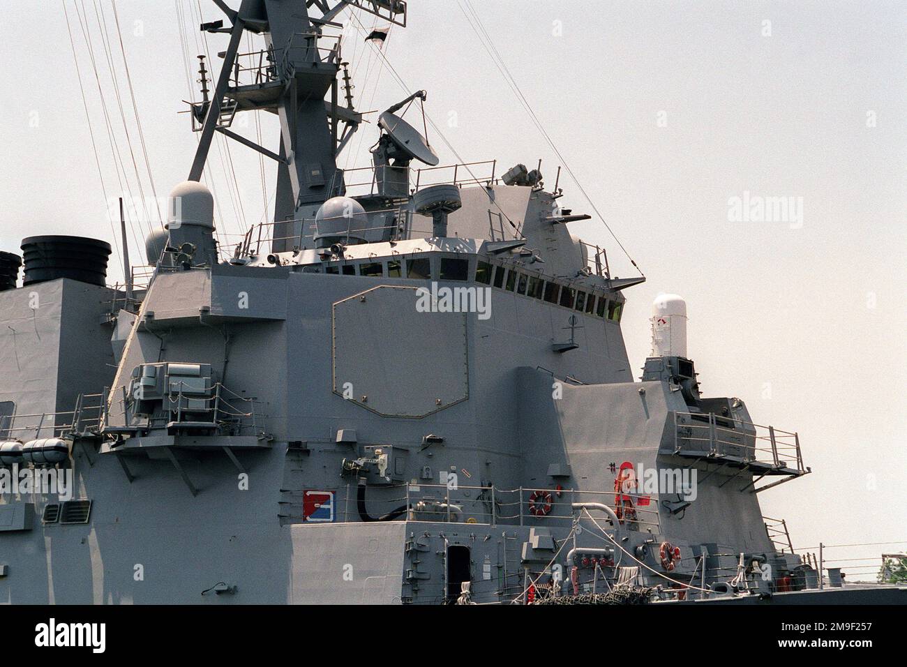 A starboard view of an AN/SLQ-32 Electronic Warfare (EW) system and a MK 15 Phalanx Close-In ...