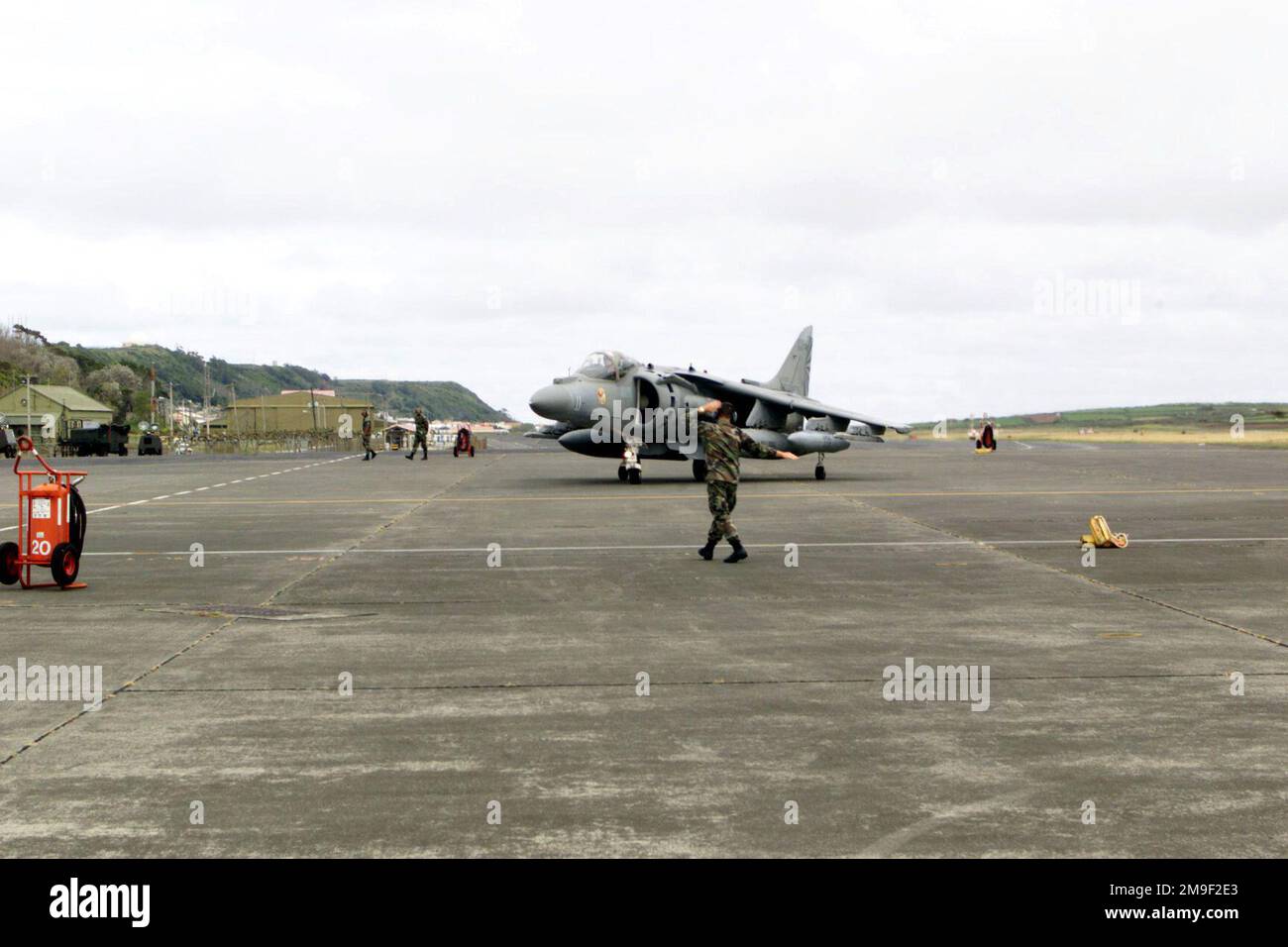 Rear view long shot as US Air Force Technical Sergeant Jeff McCoy of ...