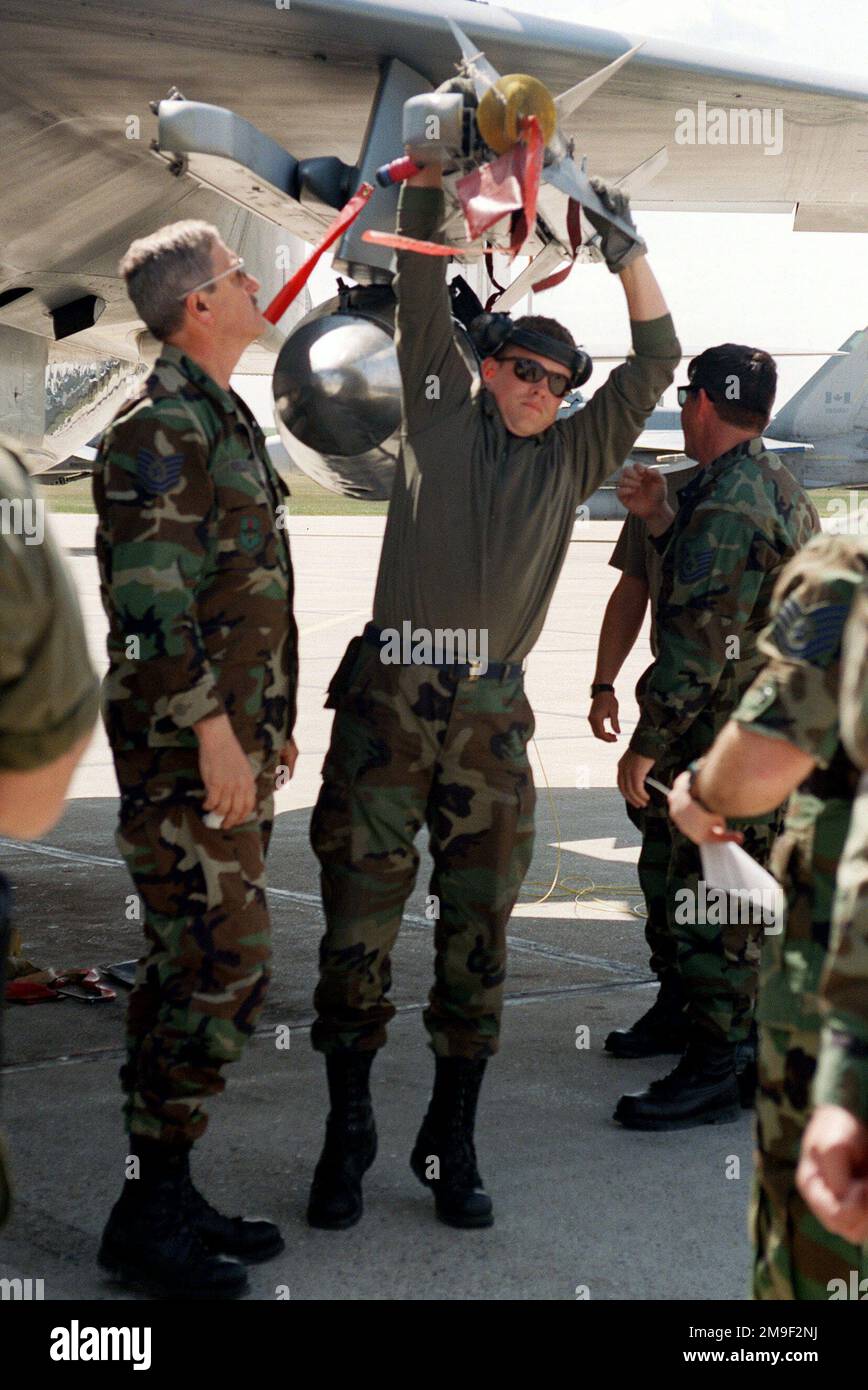 US Air Force STAFF Sergeant Keith Young (Center) makes the final ...