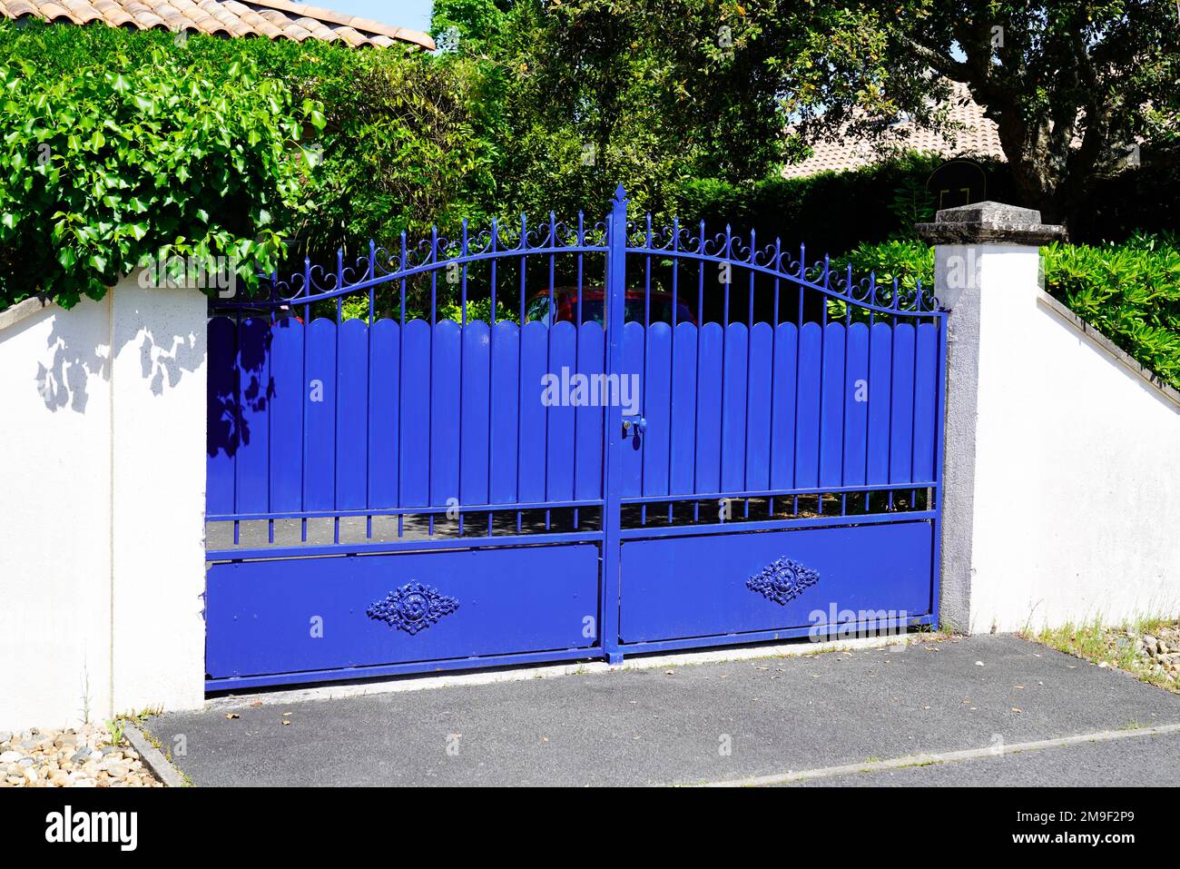 old blue classic metal home gate at entrance of house portal garden ...