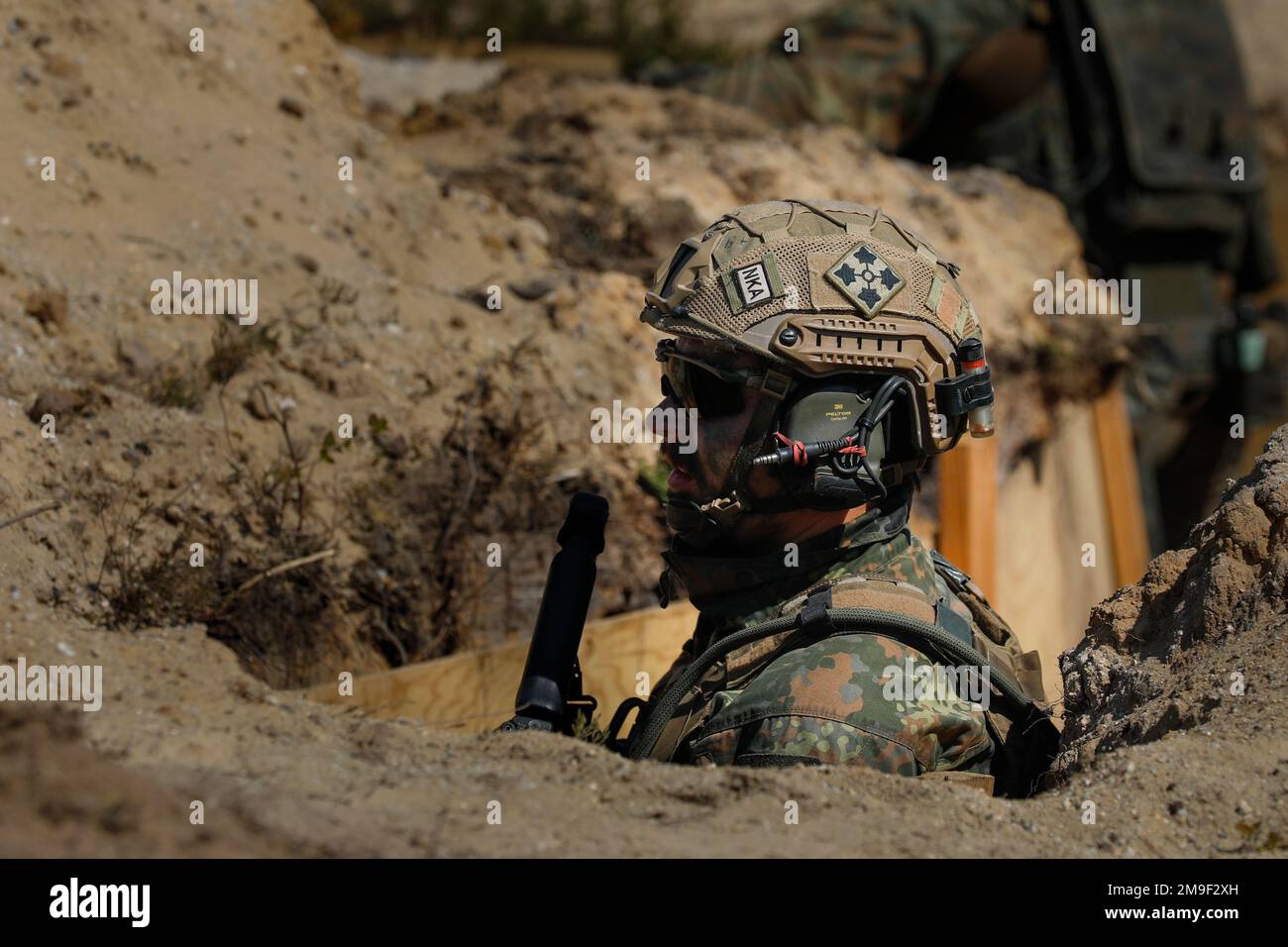 A German soldier assigned to the 212th Panzergrenadier Battalion, 21st ...