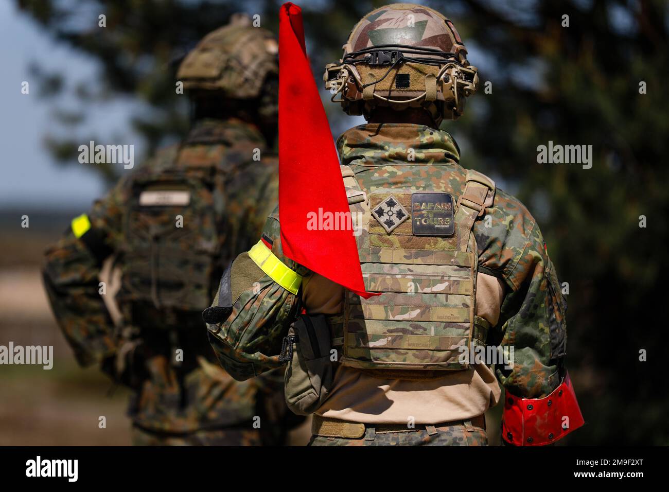 A German army range safety officer assigned to the 212th ...