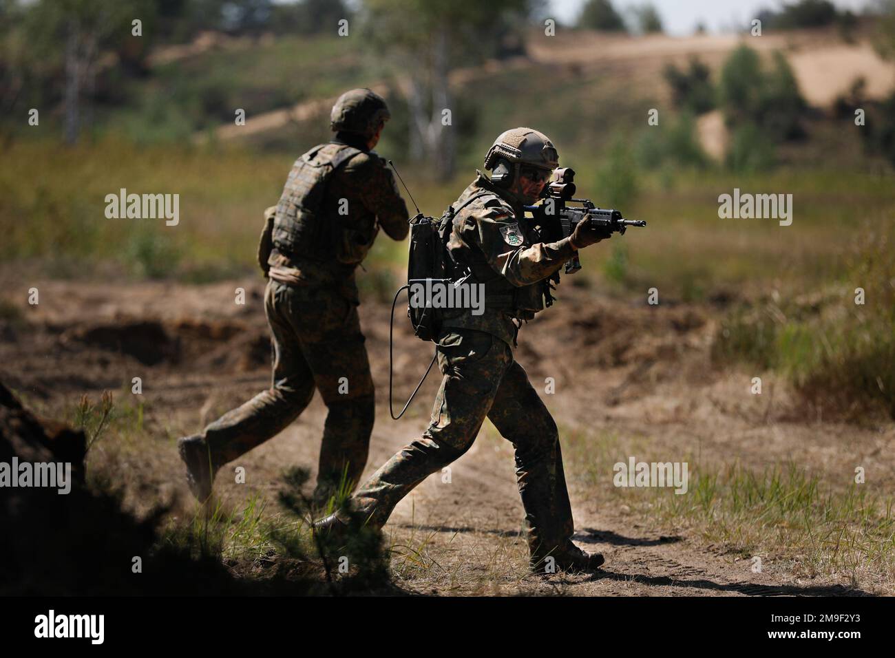 German soldiers assigned to the 212th Panzergrenadier Battalion, 21st ...