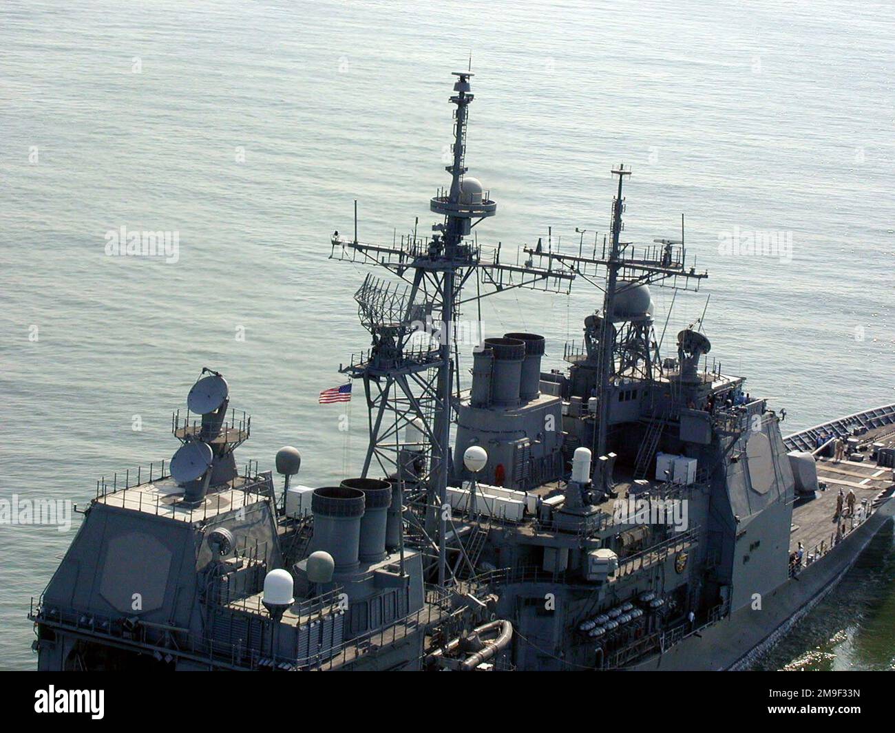 Oblique starboard amidships view of the mid section of the guided ...