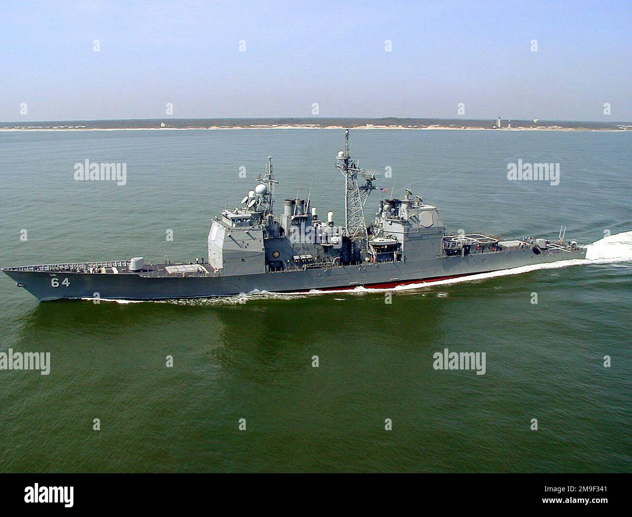 Aerial port side view of the guided missile cruiser USS GETTYSBURG (CG ...