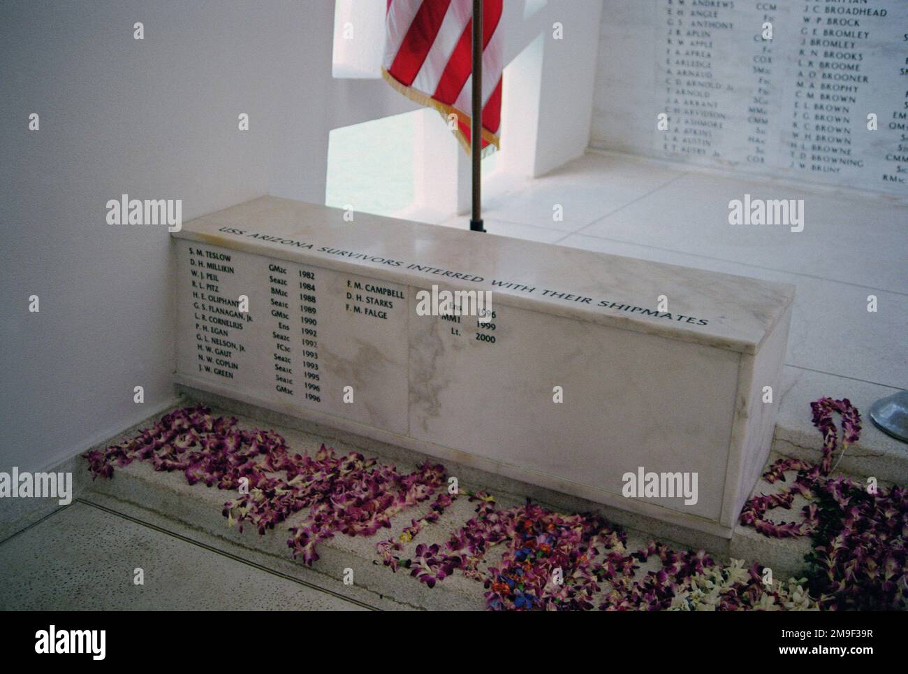 A marker inside the shrine room of the USS ARIZONA Memorial listing the ...