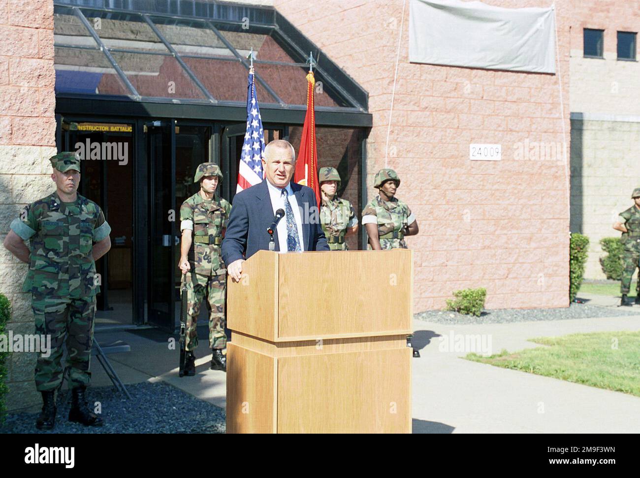 Major General (Retired) Raymond Smith speaks to Marines at a dedication ...