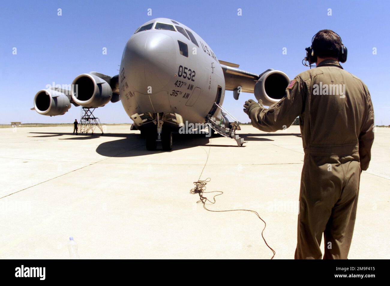 A US Air Force 437th Aircraft Generation Squadron flight crew member ...