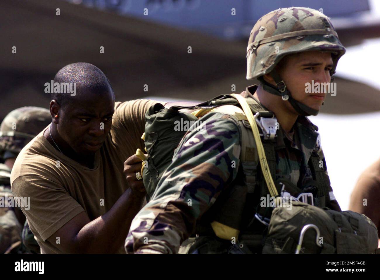 US Army Sergeant Michael Coleman performs a Jump MASTER Pre Inspection ...