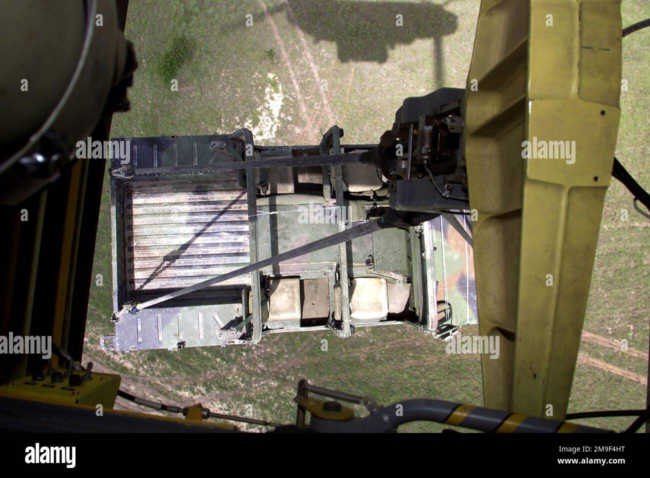 A view of a High-Mobility Multipurpose Wheeled Vehicle (HMMWV) dangles ...