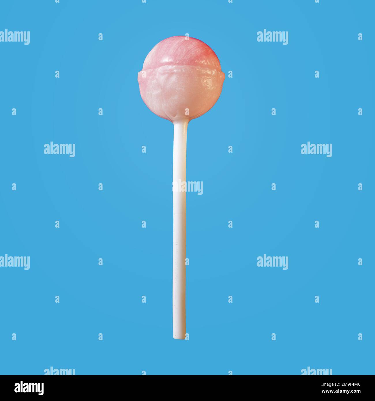 Close-up photo of a lollipop. Photo on a blue background. Isolated ...