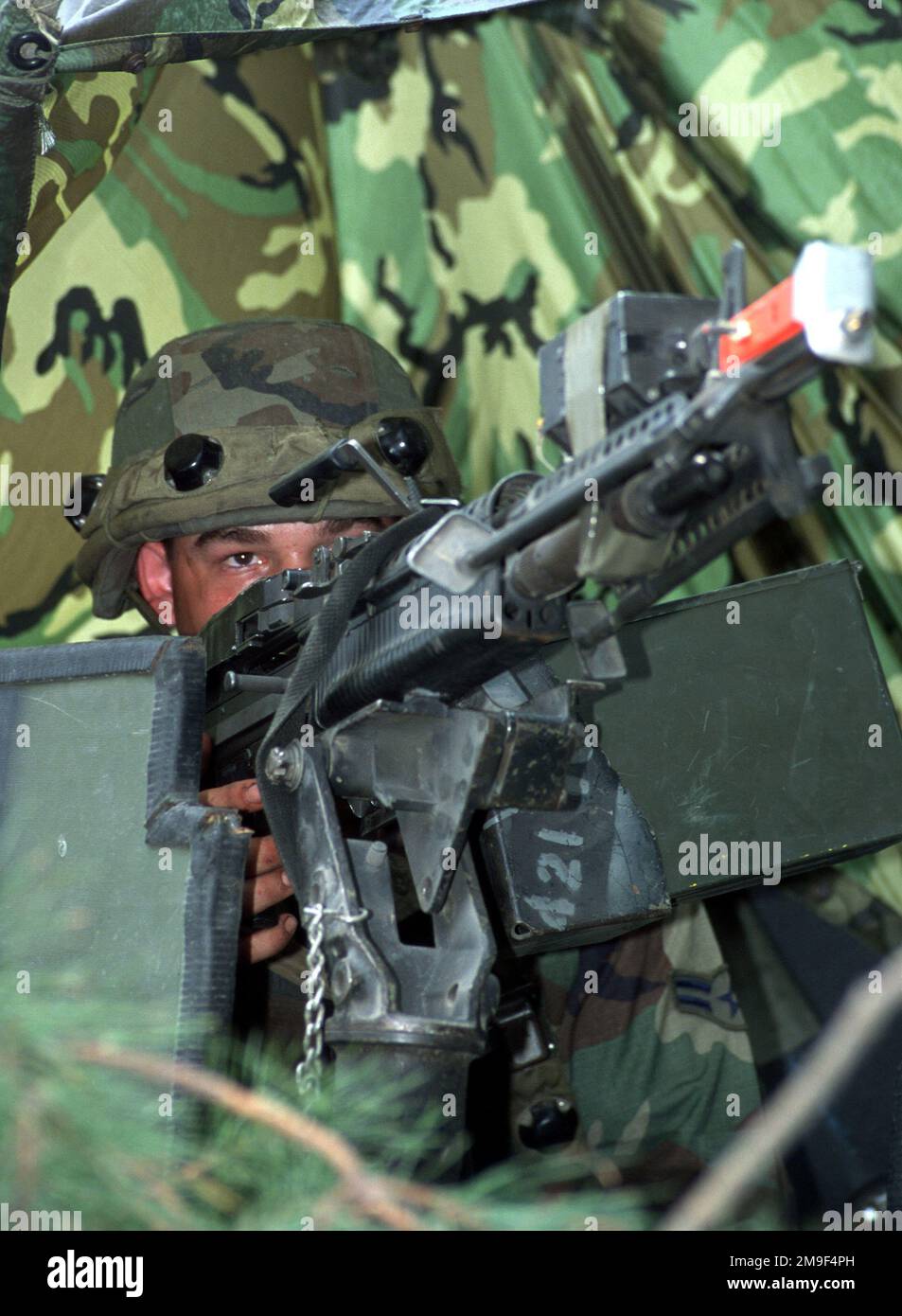 Straight on medium close-up from a low angle up at USAF AIRMAN First ...