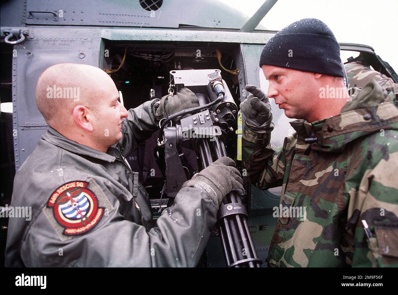 US Air Force STAFF Sergeant Joey Bishop (right), a flight engineer ...