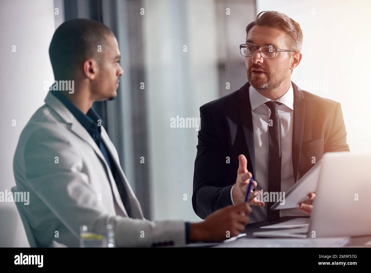 Business people, talking and tablet for planning online with partner ...