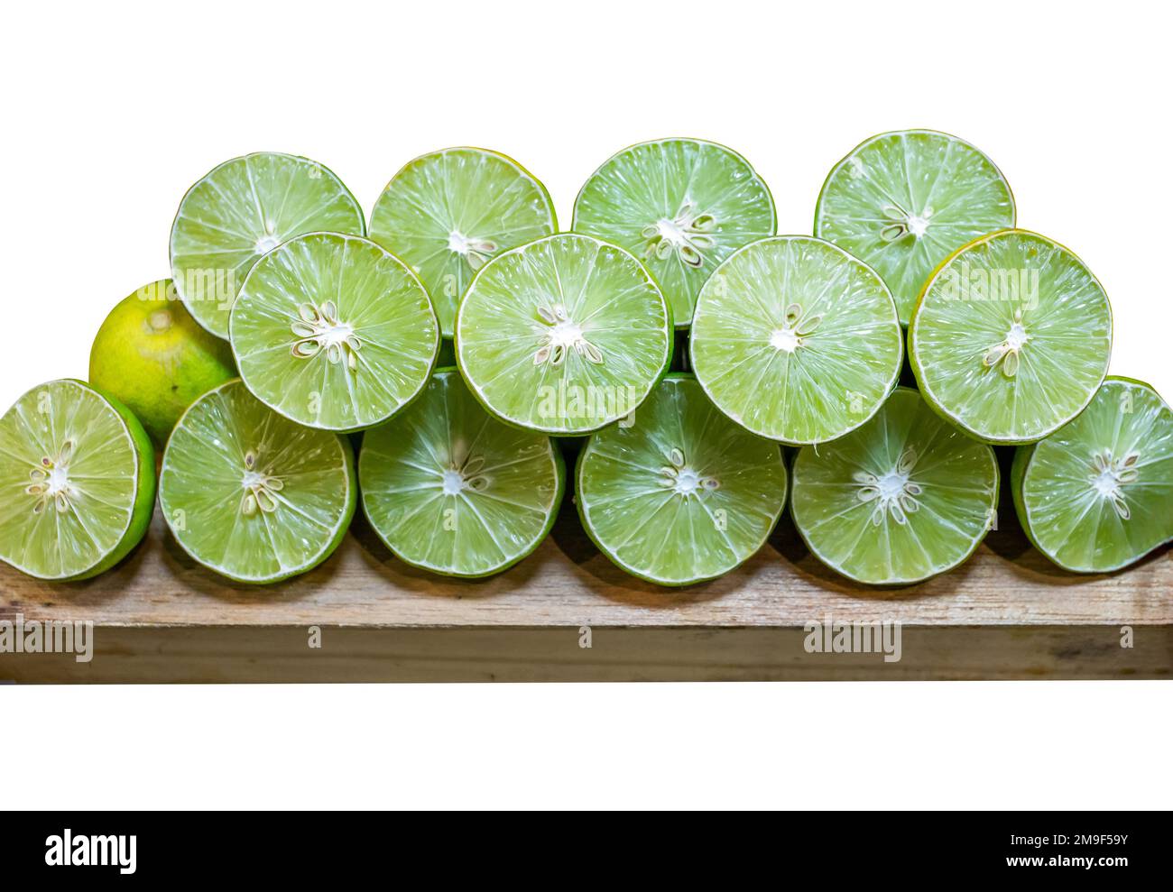 Die cut of sliced lemon on the wooden on white isolated Stock Photo - Alamy