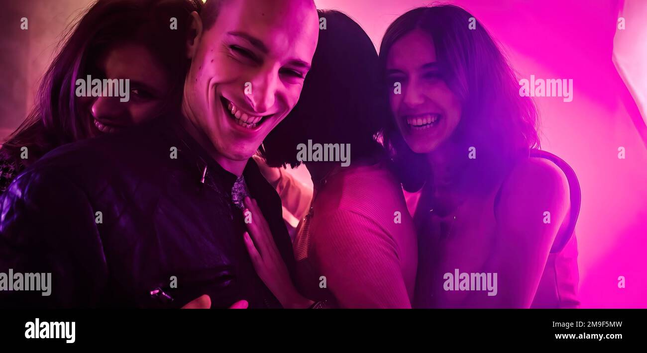 Man surrounded women nightlife hi-res stock photography and images - Alamy
