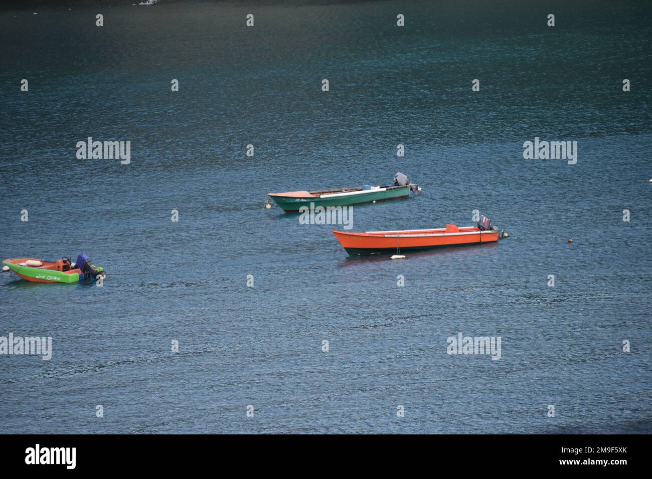 Boats in the ocean in Anse La Raye in St. Lucia Stock Photo - Alamy