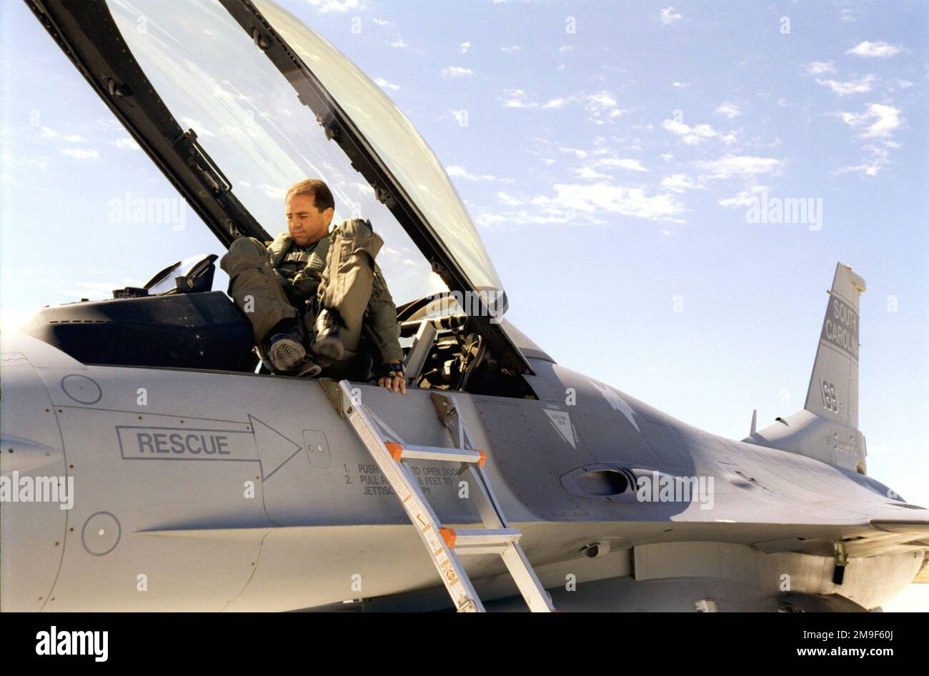 Climbing into the cockpit on the ramp at Hill Air Force Base, Utah ...