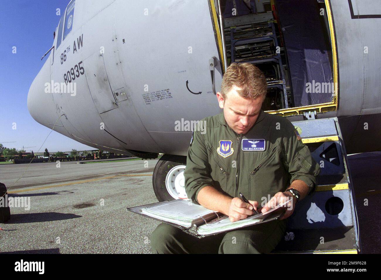 Straight on medium close-up shot as US Air Force Technical Sergeant Max ...