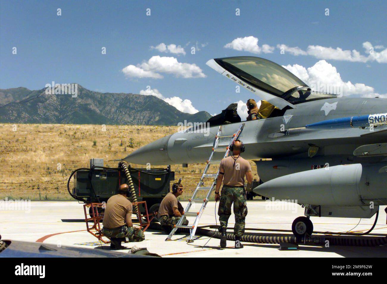 A maintenance crew troubleshoots an air conditioning malfunction on a F ...