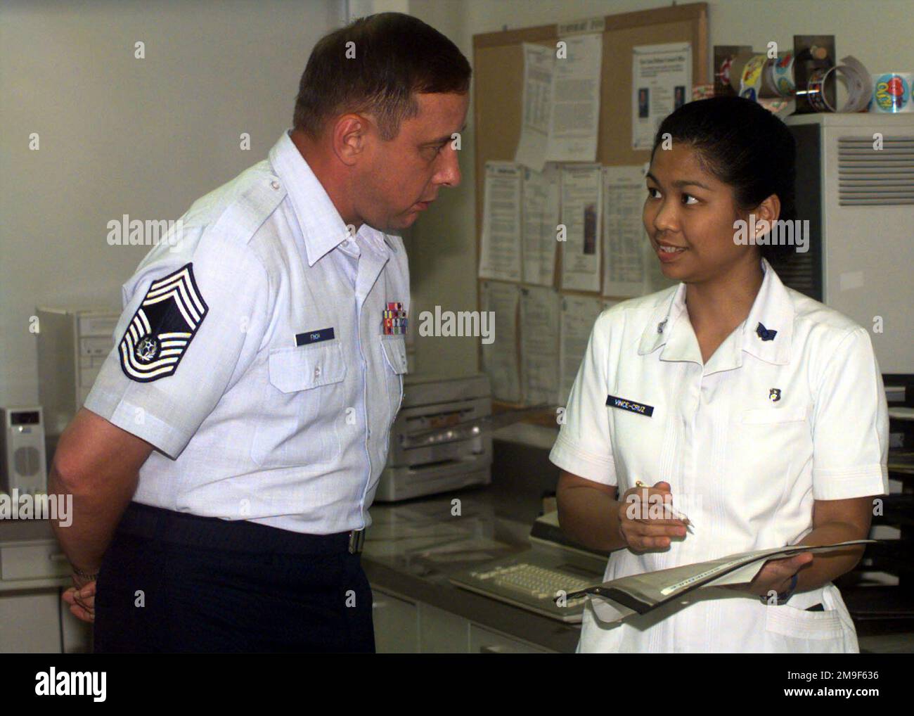 Right side profile medium close-up from the waist up of the CHIEF ...