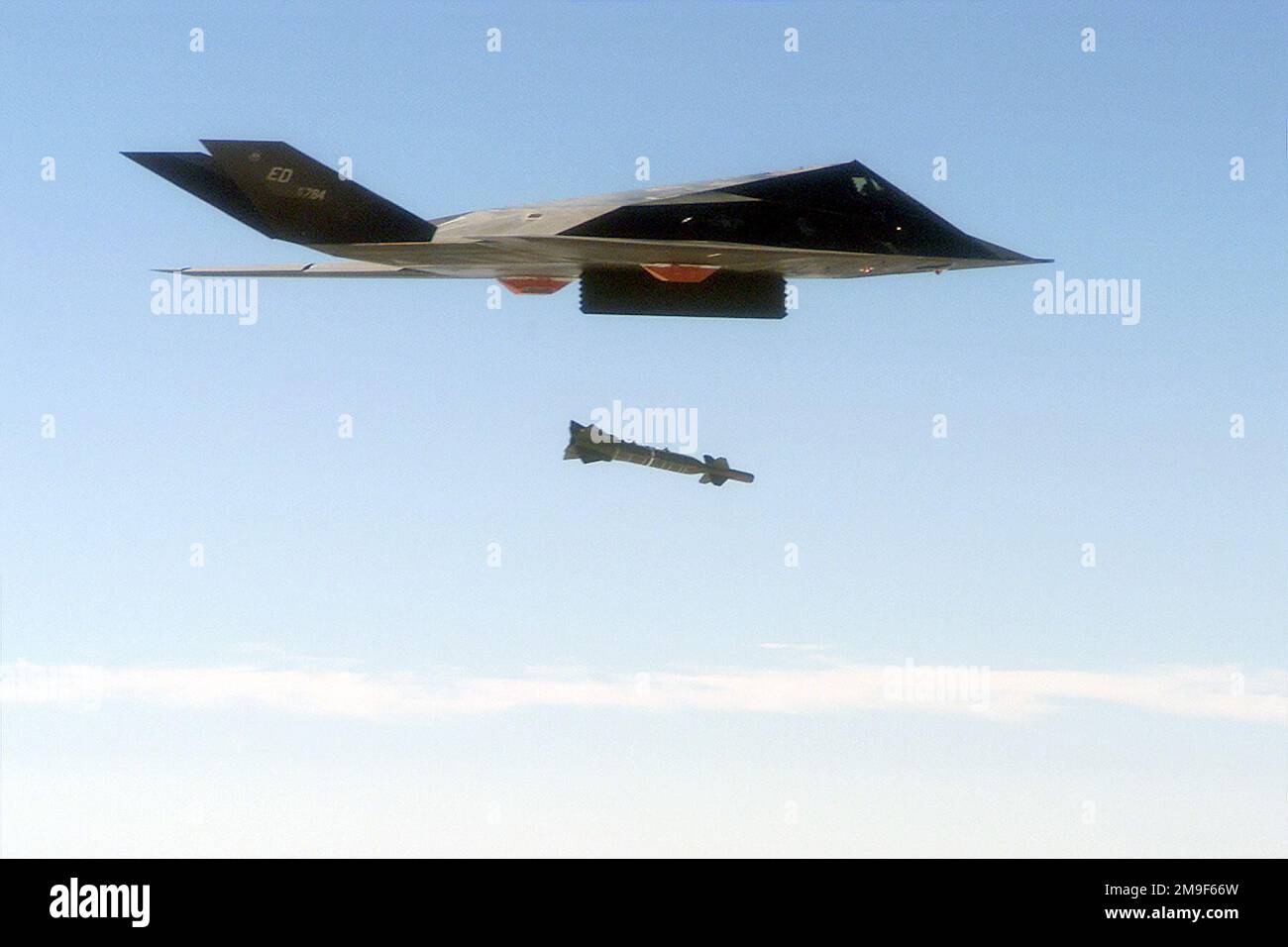 An F-117 Nighthawk engages it's target and drops a GBU-28 guided bomb ...