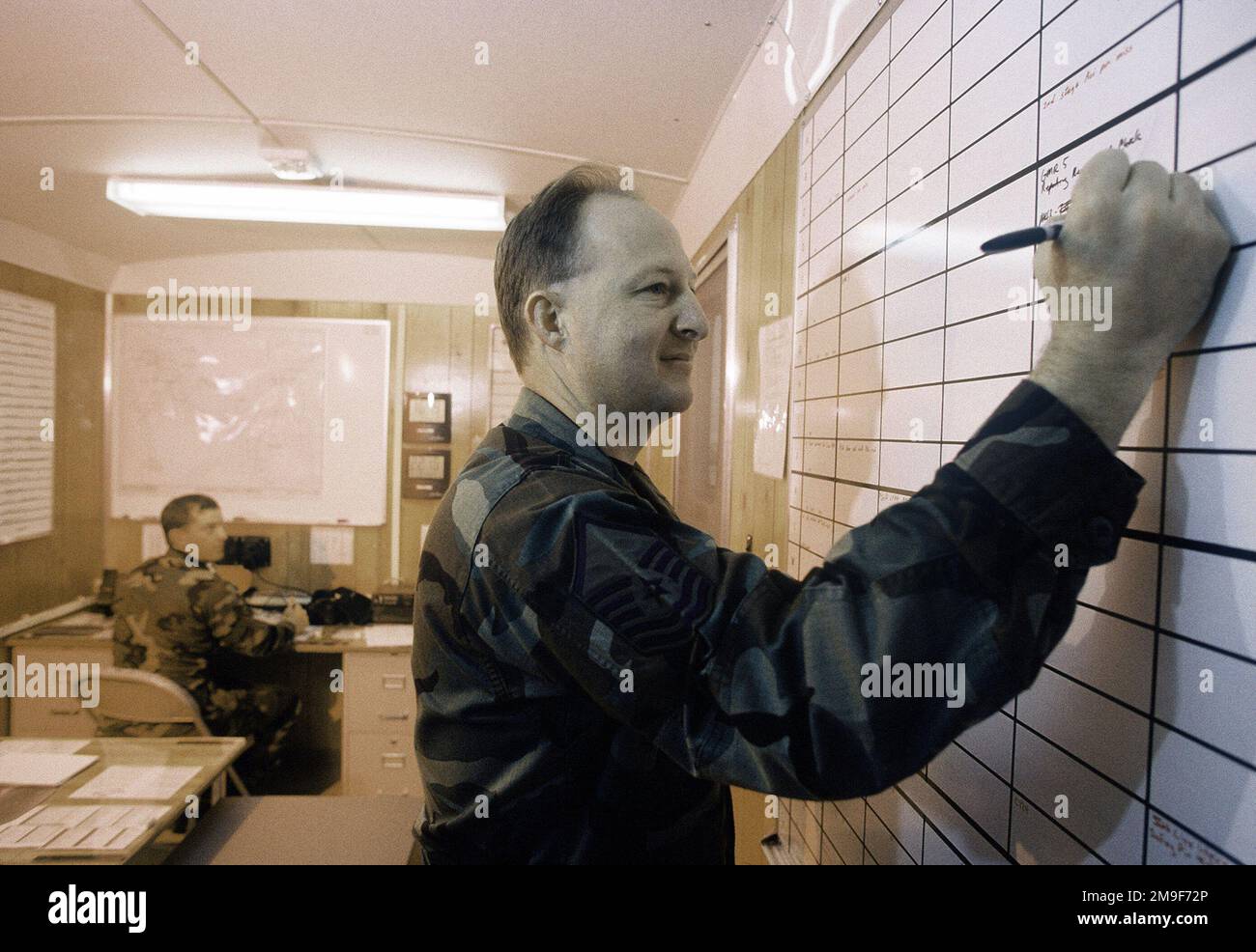 US Air Force MASTER Sergeant Mark Seery (right) and USAF STAFF Sergeant ...