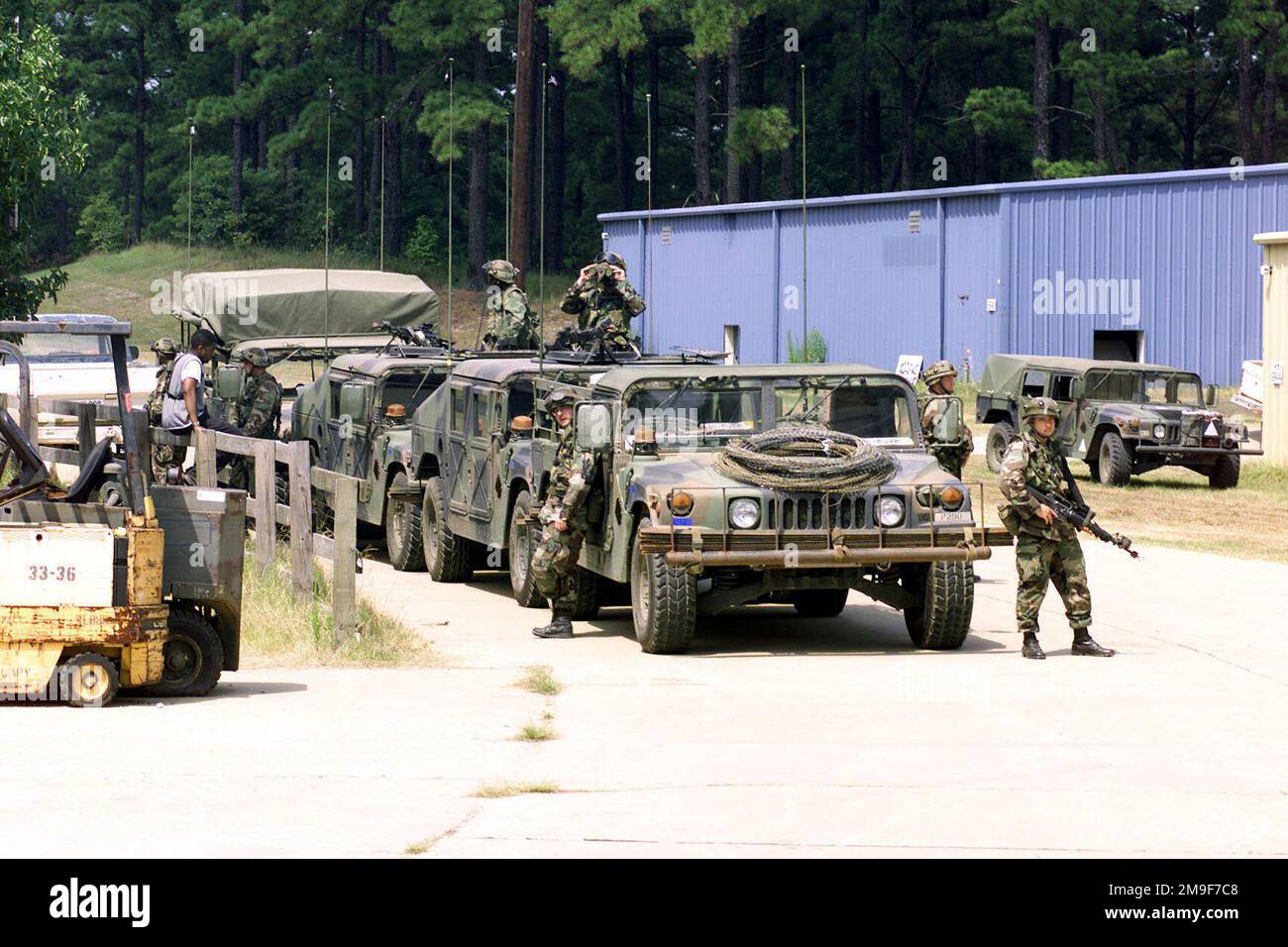 Members of the Mountain Eagle Joint Task Force, on foot and in High ...