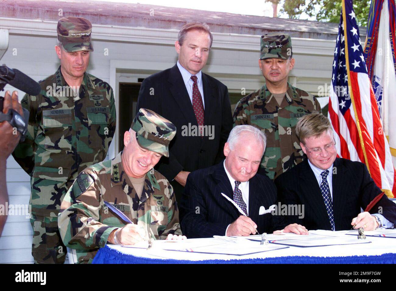 In a posed shot for the press, General John W. Hendrix (back left ...