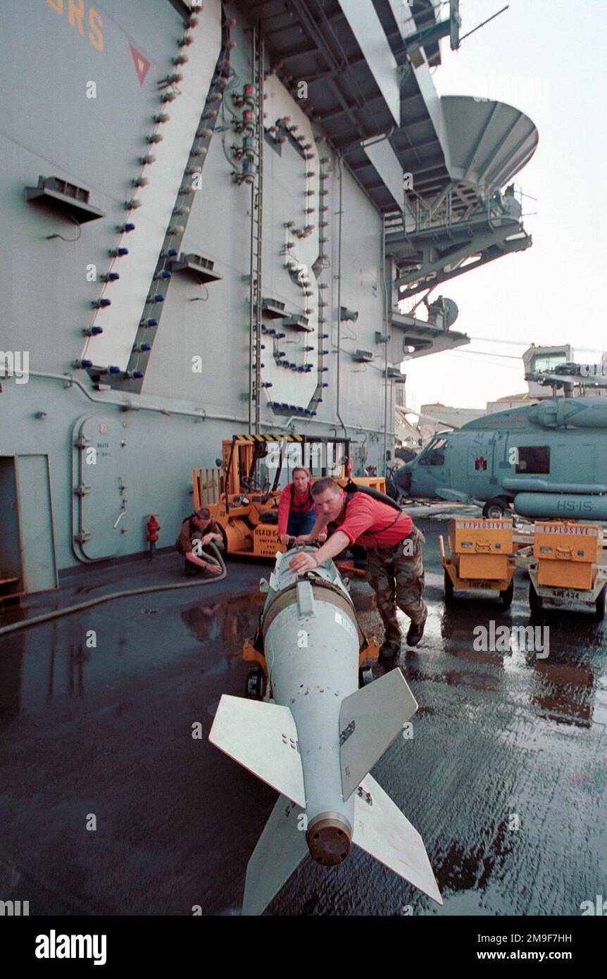 Aviation Ordnanceman 3rd Class Kimberly Berry (left) and Aviation ...