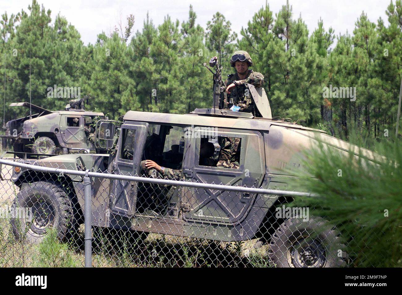 Members of Mountain Eagle Joint Task Force patrol the area in their ...