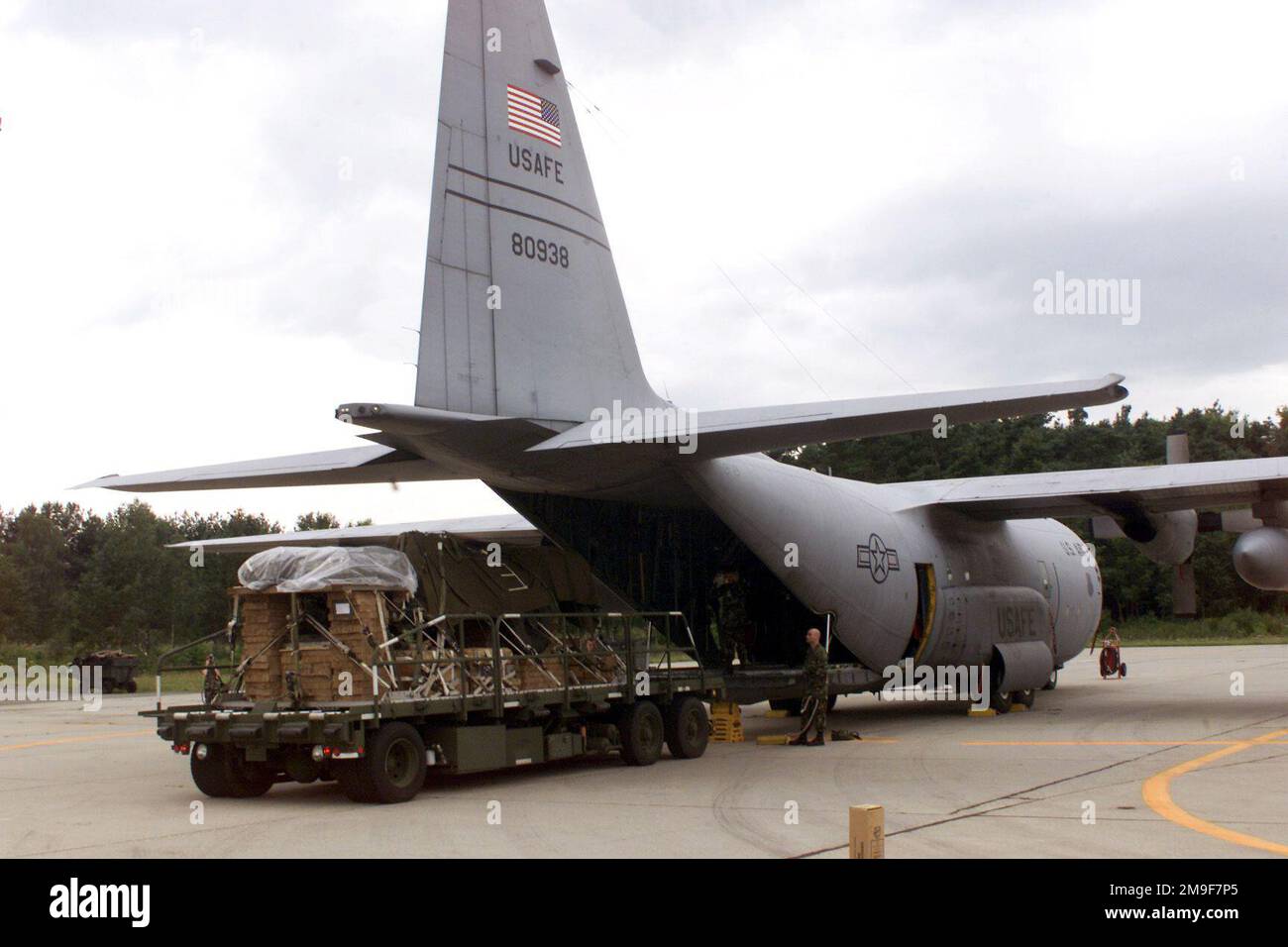 Medium long shot, right rear view, 105mm towed howitzer M119A1, on a ...