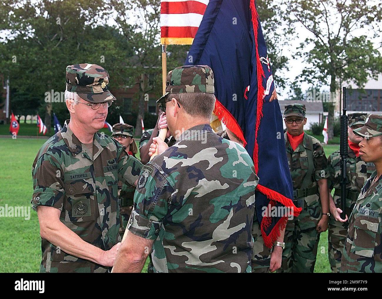 Lieutenant Colonel Douglas Satterfield, left, assumes command of the ...