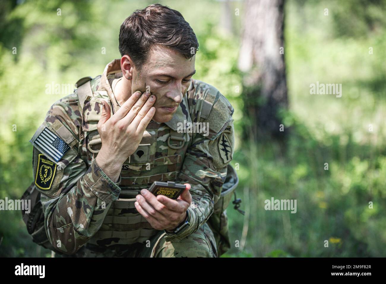 U.S. Army Spc. RJ Koreis, assigned to 3rd Psychological Operations ...