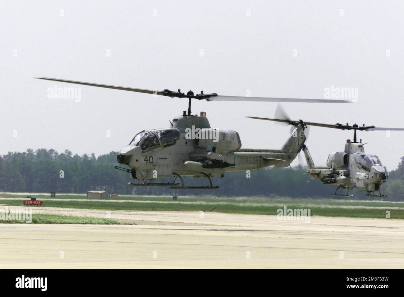 Two United States Marine Corps AH-1W Super Cobra attack helicopters ...