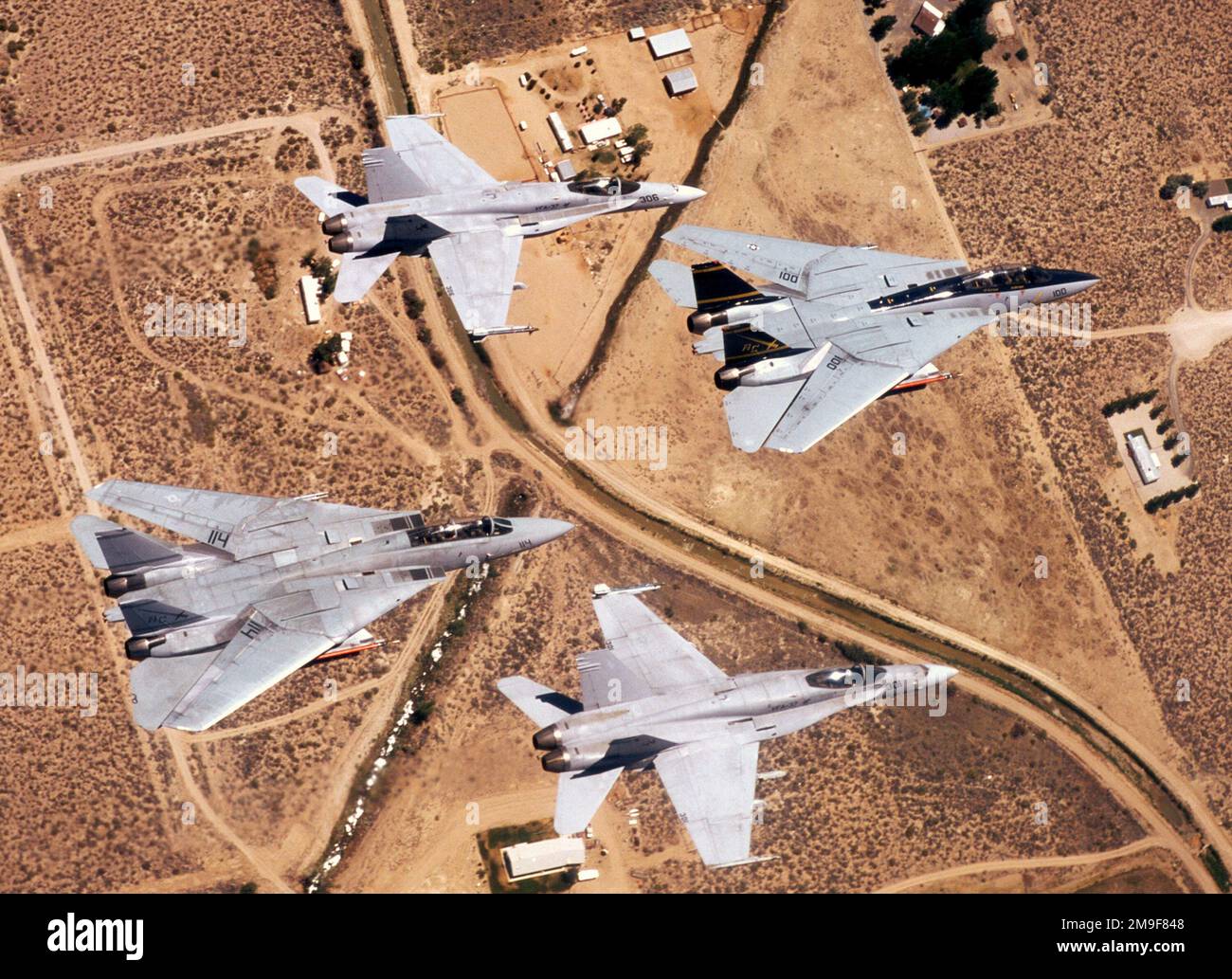 Two F-14 Tomcats from Fighter Squadron Thirty-Two (VF-32), "Swordsmen ...