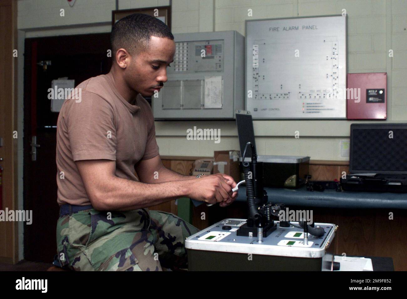 Medium shot, AIRMAN 1ST Class Desmond Waldron, an Aircrew Life Support ...